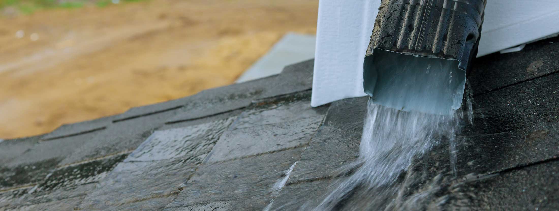 Are Your Roof Drains Causing Leaks or Damage? - Mikku & Sons Roofing